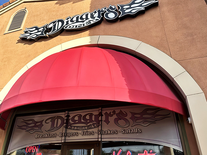 Digger's Diner welcomes you with its distinctive blue-flamed logo and inviting patio entrance&mdash;California casual meets classic Americana in Brentwood's breakfast paradise.