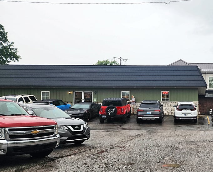 The unassuming green exterior of The Chicken House might not stop traffic, but locals know this humble building houses southern Indiana's fried chicken paradise.