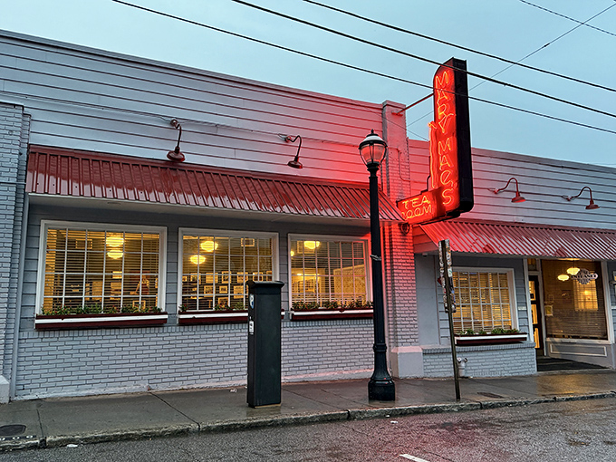 The iconic red neon sign beckons hungry souls like a lighthouse guiding ships to comfort food harbor. Mary Mac's stands proudly in Atlanta's landscape.