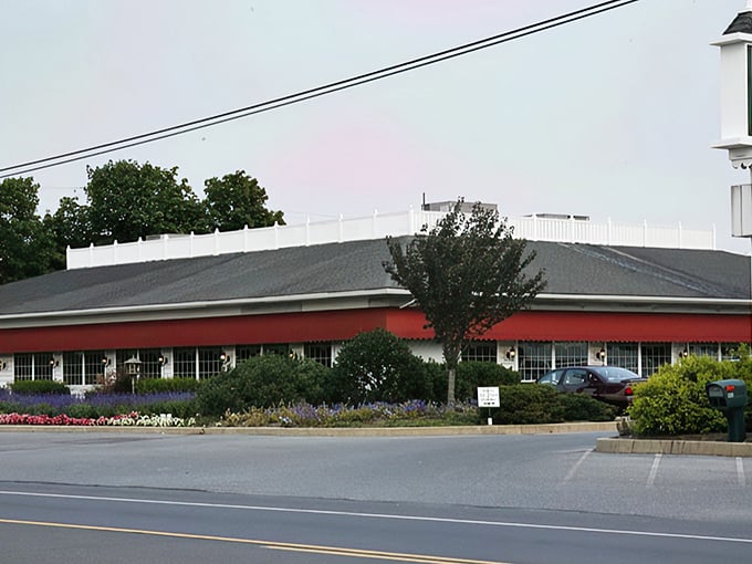 The red-accented exterior of Country Fare stands like a beacon of comfort food promise amid Pennsylvania's rolling landscape. No pretension, just delicious anticipation.