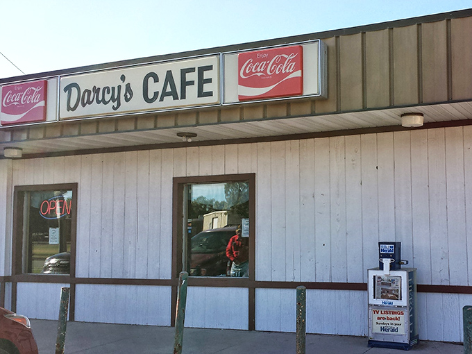 That unassuming facade holds more breakfast magic than a dozen trendy brunch spots combined, vintage Coca-Cola signs included.