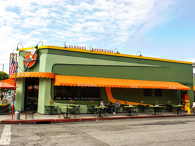 The mint-green exterior with punchy orange awnings looks like a Wes Anderson film set came to life on Vermont Avenue.