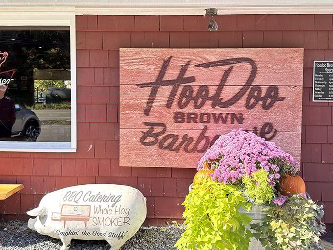That wooden sign promises what lies within &ndash; authentic barbecue that would make a Texan tip their hat. The seasonal flowers add a touch of New England charm.