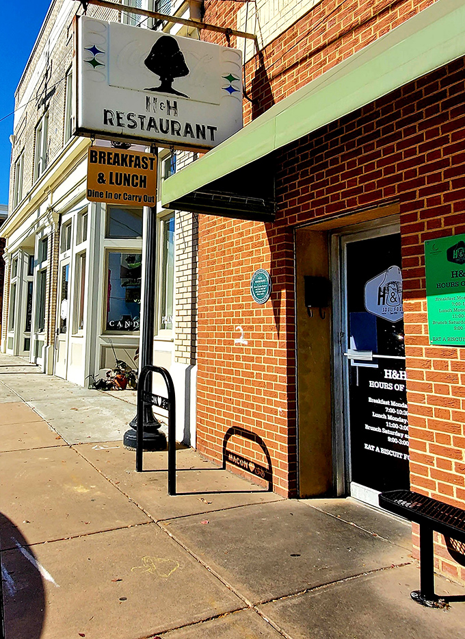 The unassuming brick exterior of H&H Restaurant in Macon hides culinary treasures that have kept locals coming back for generations.
