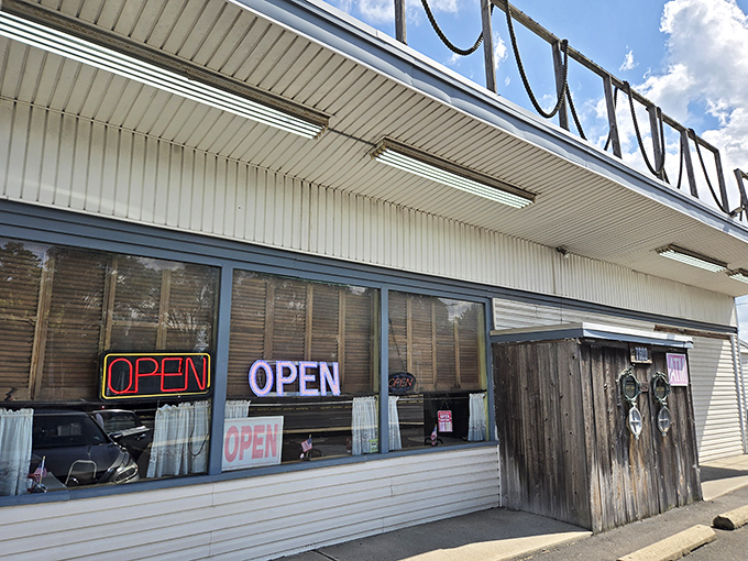 The unassuming exterior of Under the Pier is like finding a secret treasure map &ndash; those neon "OPEN" signs are practically winking at you.