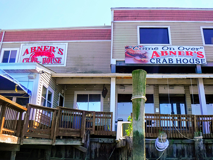 The waterfront view of Abner's invites seafood lovers to "Come On Over" for an authentic Maryland crab experience.