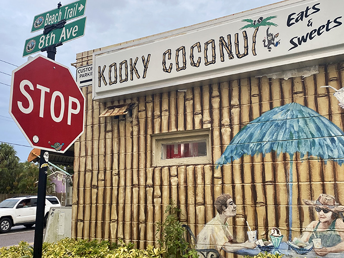 The bamboo fortress of flavor! Kooky Coconut's distinctive tiki-inspired exterior stands at the corner of 8th Avenue and Gulf Boulevard, promising tropical delights within.
