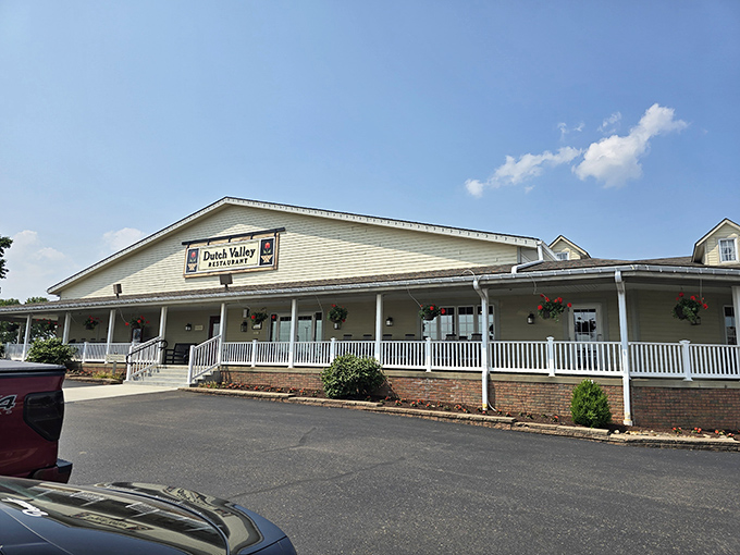 The welcoming front porch of Dutch Valley Restaurant invites you in with its charming country style and hanging flower baskets.