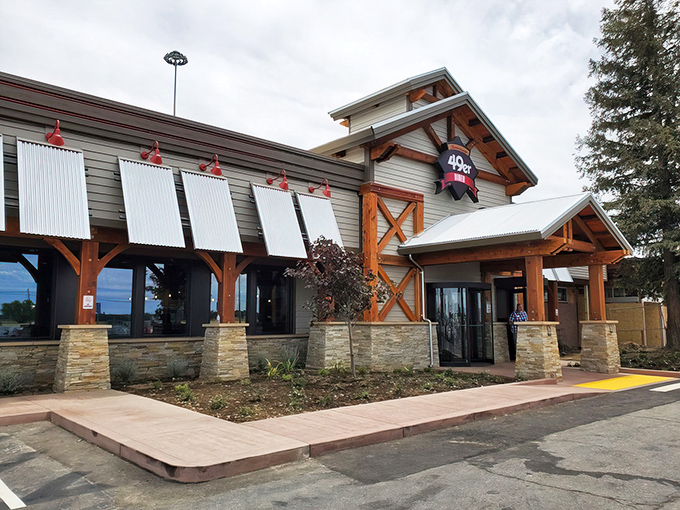 The 49er Diner's rustic exterior beckons with its wooden beams and stone accents, promising Gold Rush-era comfort in modern Sacramento.