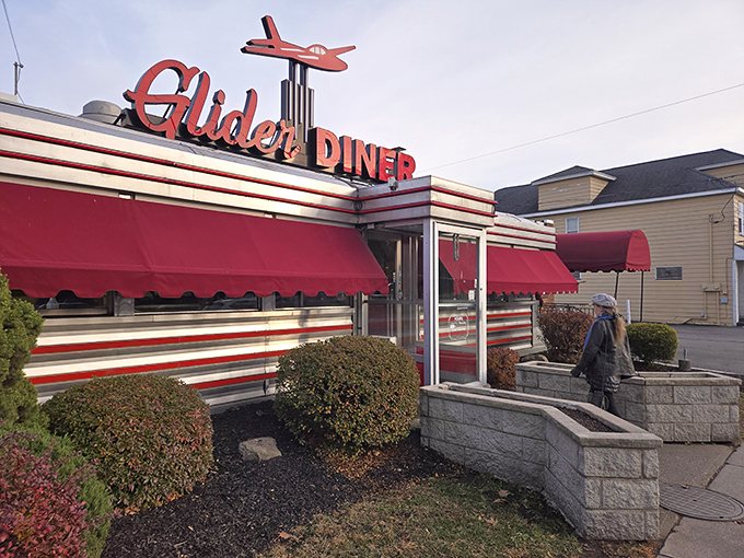 The iconic red Glider Diner sign rises over Scranton like a glowing promise of comfort food and nostalgia. This is classic Americana at its best.