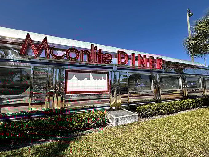 Chrome gleaming under the Florida sun, Moonlite Diner's exterior promises a time-traveling feast. Those red letters practically scream "comfort food ahead!"