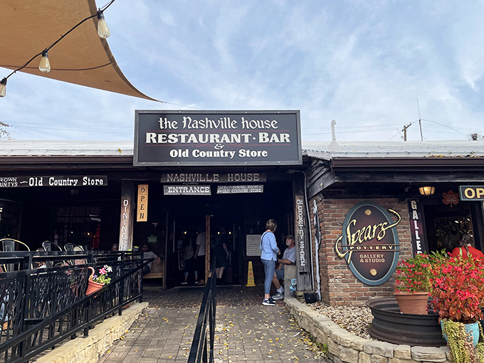 The unassuming entrance to The Nashville House beckons like an old friend, promising comfort food treasures within this Brown County landmark.