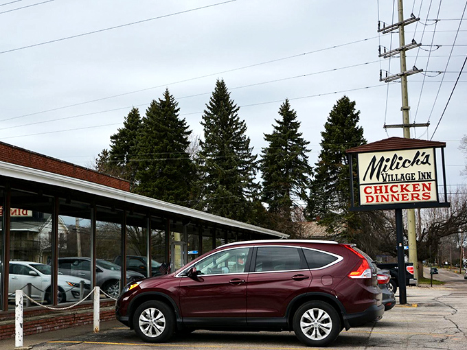 The unassuming exterior of Milich's Village Inn hides culinary treasures like a poker player concealing a royal flush.