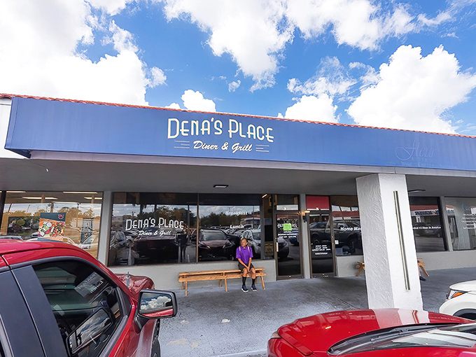 The bright blue exterior of Dena's Place stands out like a beacon of breakfast hope against Florida's sunny skies. No fancy frills needed here.