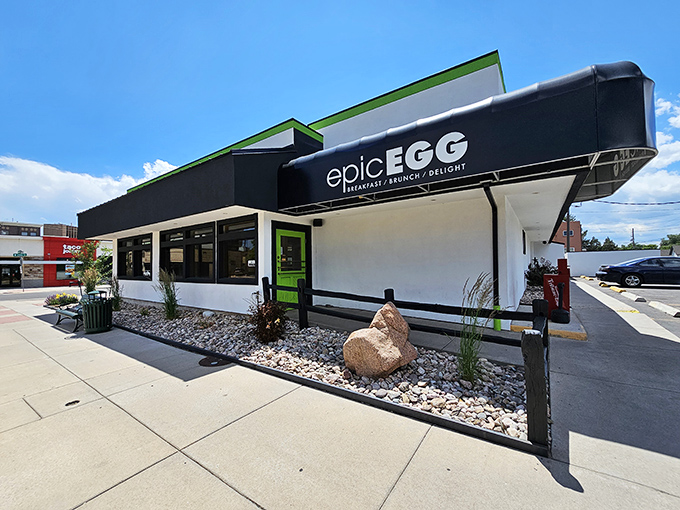 Epic Egg's crisp white exterior with vibrant green accents stands like a beacon of breakfast hope on Cheyenne's bustling streets &ndash; promising culinary adventures within.