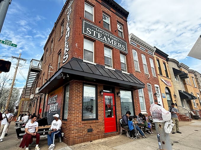 The iconic brick exterior of L.P. Steamers stands proudly in Locust Point, its vertical sign a beacon for crab enthusiasts throughout Maryland.
