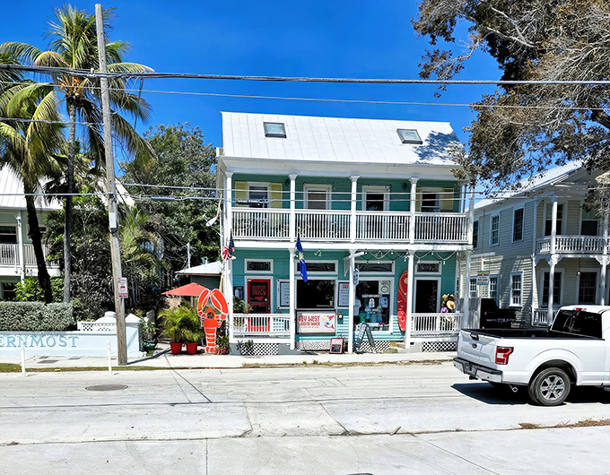 A turquoise beacon of seafood salvation in Key West, where the American flag waves as if to say, "Your lobster search ends here, patriot."