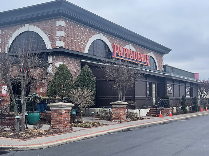The brick facade of Pappadeaux welcomes you like an old friend with a secret, complete with a covered entrance that practically whispers "come on in."