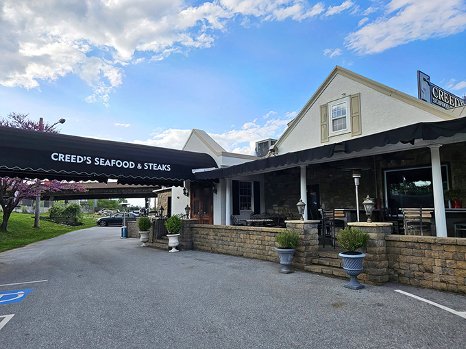 Stone walls and black awnings welcome you to Creed's&mdash;like finding a secret clubhouse where the password is "delicious seafood" and everyone's invited.