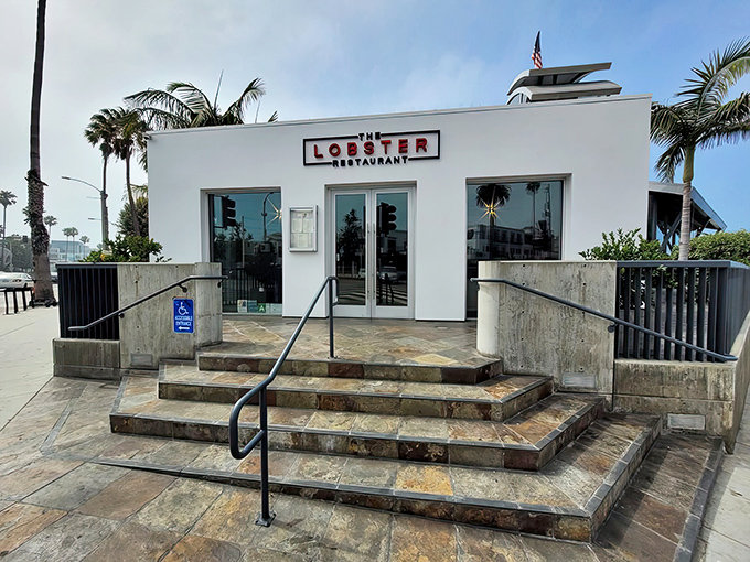 The unassuming white exterior of The Lobster belies the seafood magic happening inside. Like finding a pearl in an oyster, this entrance promises treasures within.