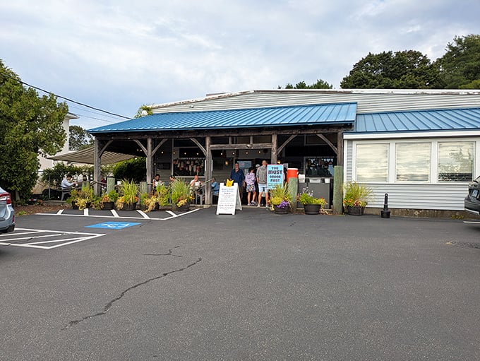 The blue-roofed beacon of seafood salvation sits unassumingly on Aquidneck Avenue, promising treasures from the deep without maritime pretension.