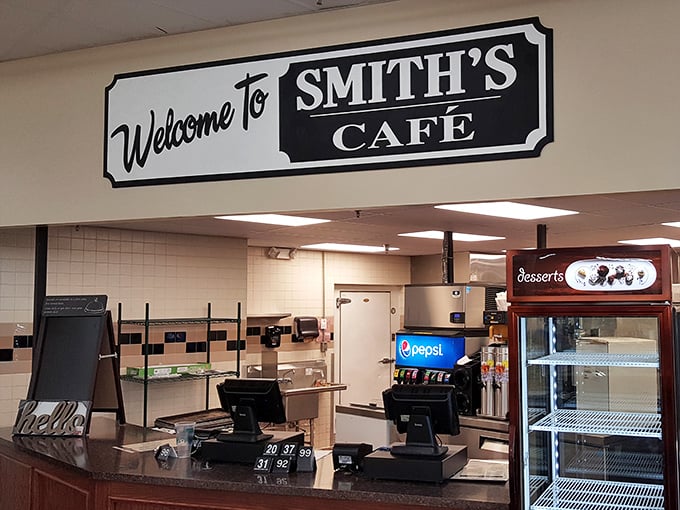 The classic black and white "Welcome to Smith's Cafe" sign promises no frills, just honest-to-goodness food that makes your taste buds stand at attention.