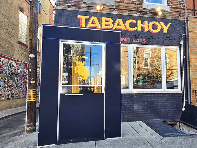 The navy blue storefront with bright yellow "TABACHOY" signage isn't just a restaurant&mdash;it's a portal to Filipino flavor paradise waiting to be discovered.