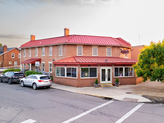 Two stories of brick-and-mortar history where Ohio's canal workers once gathered, now serving modern comfort.