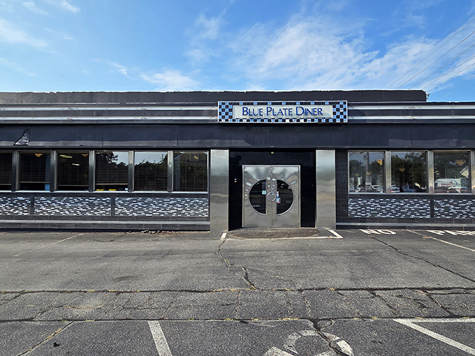 The unassuming exterior of Blue Plate Diner hides culinary treasures within, like finding a Michelin star behind a gas station.