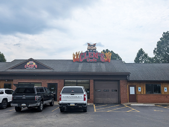 The unmistakable Clem's Cafe sign, complete with sunglasses-wearing pig mascot, promises smoky delights within. Hardwood BBQ never looked so inviting against the Pennsylvania sky.