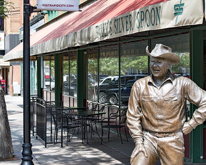 Downtown Rapid City's culinary cornerstone sports a classic black awning and welcoming facade that whispers, "Yes, the food inside is every bit as good as you've heard."