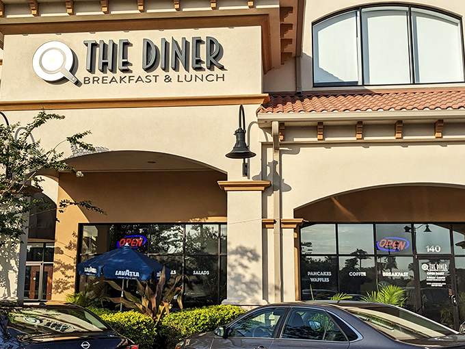 Mediterranean charm meets breakfast paradise at @The Diner's inviting exterior, where culinary adventures await behind those welcoming arches.