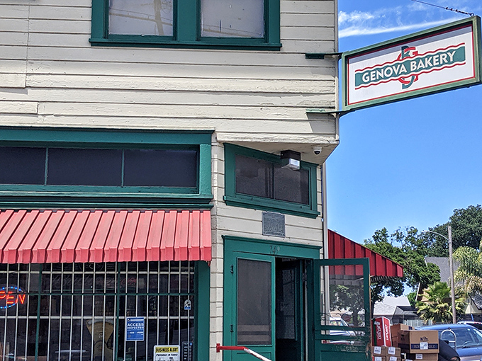 The white clapboard exterior with green trim and red awning stands like a time capsule on this Stockton corner. Some buildings just look delicious.