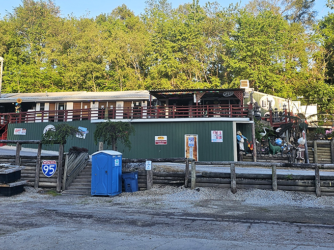 The outdoor deck at Tackle Box 2 beckons summer diners with the promise of cold drinks, hot perch, and conversations that flow as easily as the nearby river.
