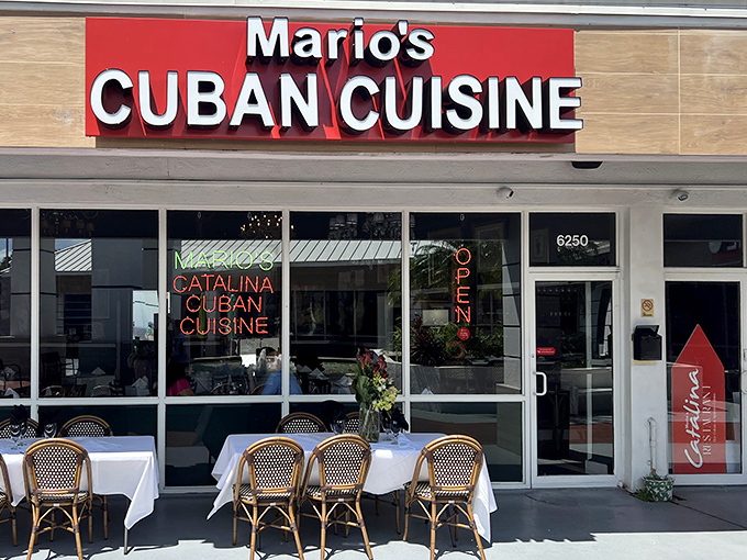 The bold red signage promises Cuban cuisine, but those bistro chairs whisper "stay awhile" &ndash; a perfect Florida afternoon awaits.