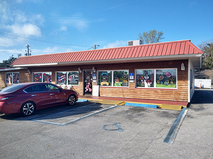 The unassuming wooden exterior with its bright red roof is like finding a treasure map where X marks the spot for breakfast gold.