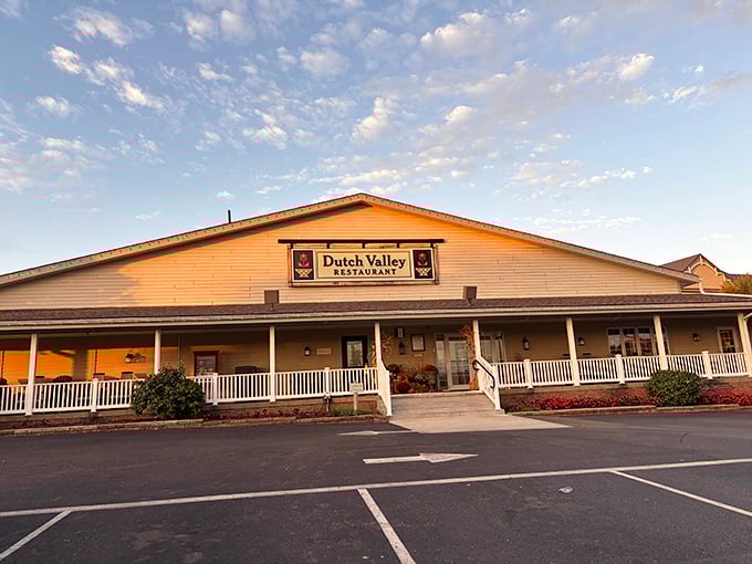 The welcoming facade of Dutch Valley Restaurant stands like a beacon of comfort food promise in Sugarcreek's rolling countryside.