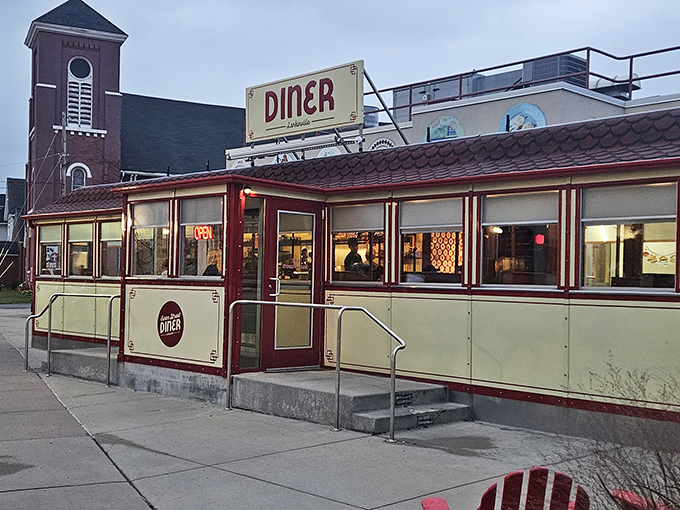 Bathed in sunshine, the classic Sterling diner car shows off its mid-century curves and chrome details &ndash; architectural eye candy for hungry visitors.