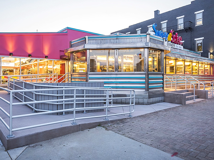 The pink and blue exterior of Sugar n' Spice isn't just a building&mdash;it's a mood-altering device that promises happiness served on a plate.