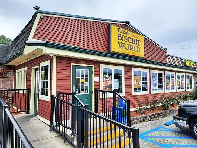The iconic red-roofed Tudor's Biscuit World stands like a beacon of breakfast hope in Nitro, promising carb-laden bliss to all who enter.