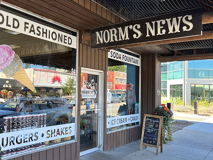 The classic storefront of Norm's beckons like a time machine disguised as a soda fountain, promising burgers, shakes, and a hefty dose of nostalgia.