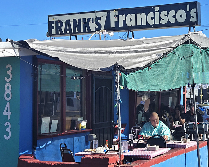 Frank's/Francisco's sign stands as a beacon for breakfast seekers, promising no-frills dining where the food speaks louder than any fancy decor ever could.