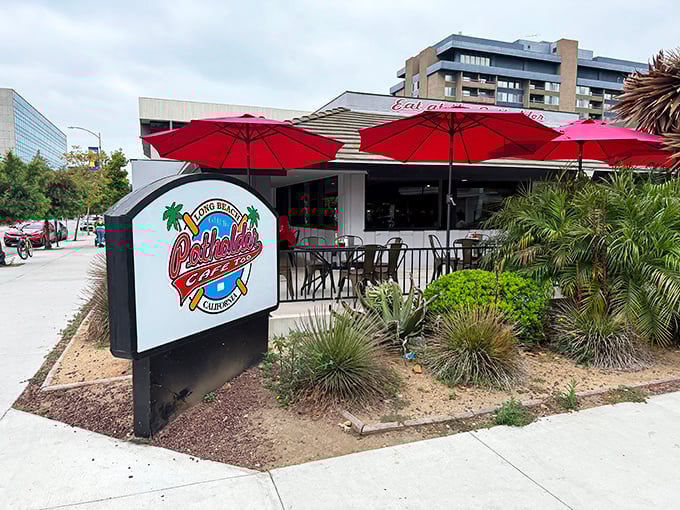 Red umbrellas and desert landscaping create that quintessential SoCal vibe&mdash;breakfast with a side of sunshine.