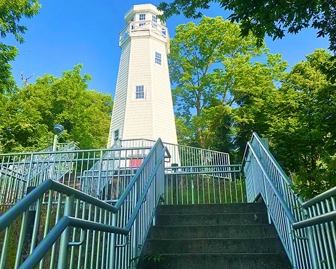 The gleaming white Mark Twain Memorial Lighthouse stands tall against a perfect blue sky, beckoning visitors up those 244 steps.
