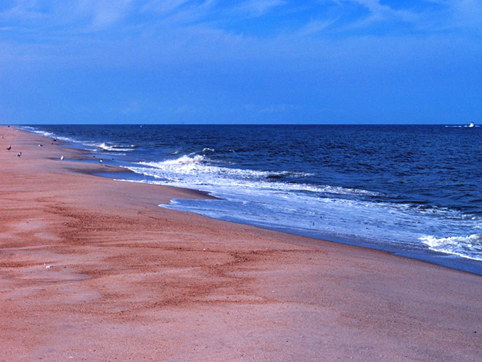 That powdery sand stretching endlessly toward the horizon makes every stress knot in your shoulders instantly dissolve.