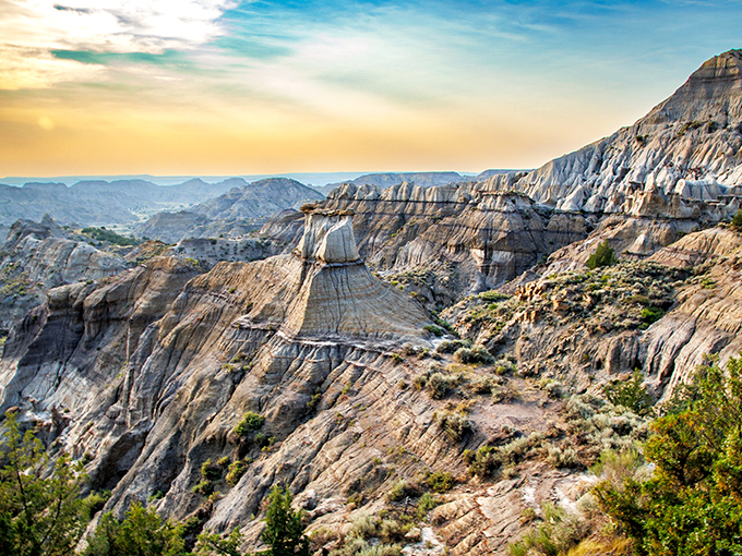 Nature's grand sculpture garden stretches to the horizon at Makoshika, where 65 million years of geological artistry creates a landscape that would make Georgia O'Keeffe reach for her paintbrush.