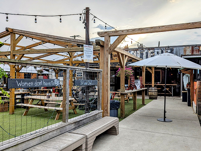 The outdoor patio at Walter's BBQ beckons with rustic wooden beams, string lights, and picnic tables where strangers become friends united by smoked meat magic.