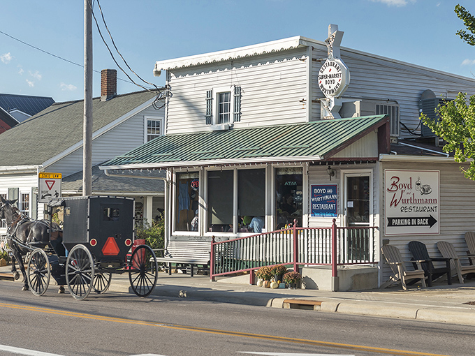 The unassuming exterior of Boyd & Wurthmann Restaurant in Berlin, Ohio, where culinary magic happens behind that modest storefront. Small town, big flavors!