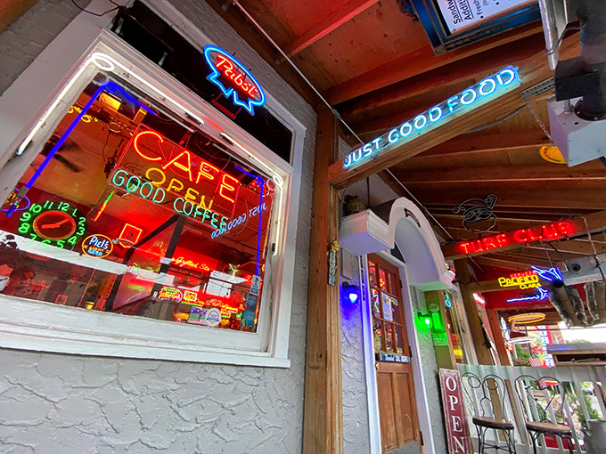 The neon-lit facade of The Turf Club glows like a beacon for burger enthusiasts, promising "Just Good Food" and delivering an experience that exceeds the hype.