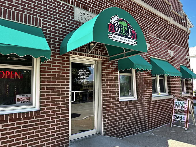 The iconic green awnings of Orsi's welcome you like an old friend who happens to make the best pizza in town. No fancy frills needed when the food speaks this loudly.